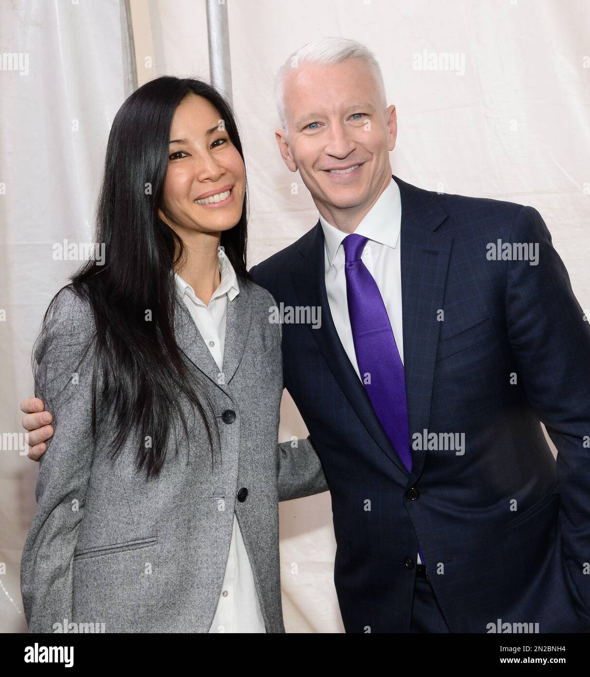Television journalist Lisa Ling, left, and news anchor Anderson Cooper ...