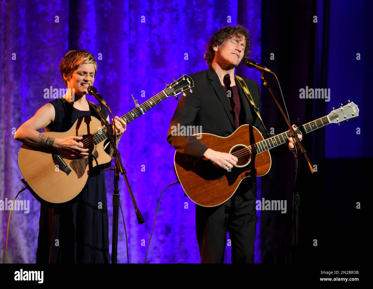 Deb Talan, left, and Steve Tannen, of The Weepies, perform a tribute to ...