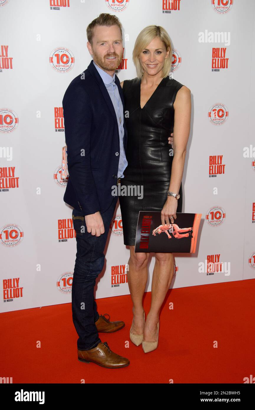James Midgley and Jenni Falconer pose for photographers upon arrival ...