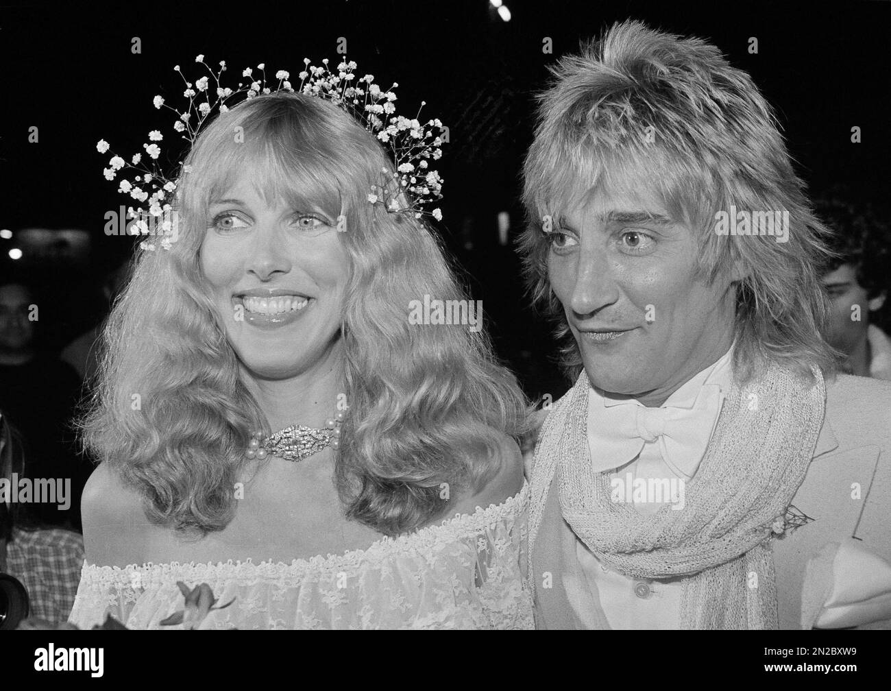 Alana Hamilton Stewart, left, walks with her new husband rock singer ...