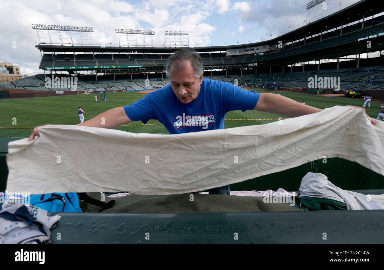 Ron Hayden from Chicago, sets up in the left field bleachers before a ...