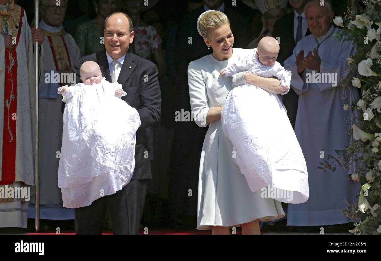 Prince Albert II of Monaco and his wife Princess Charlene pose with ...