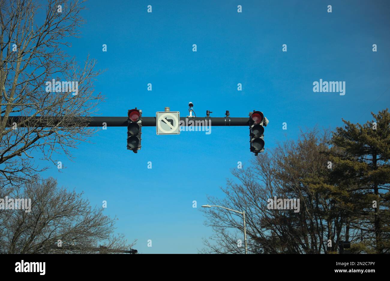 Street Stoplight warning sign at intersection Stock Photo - Alamy