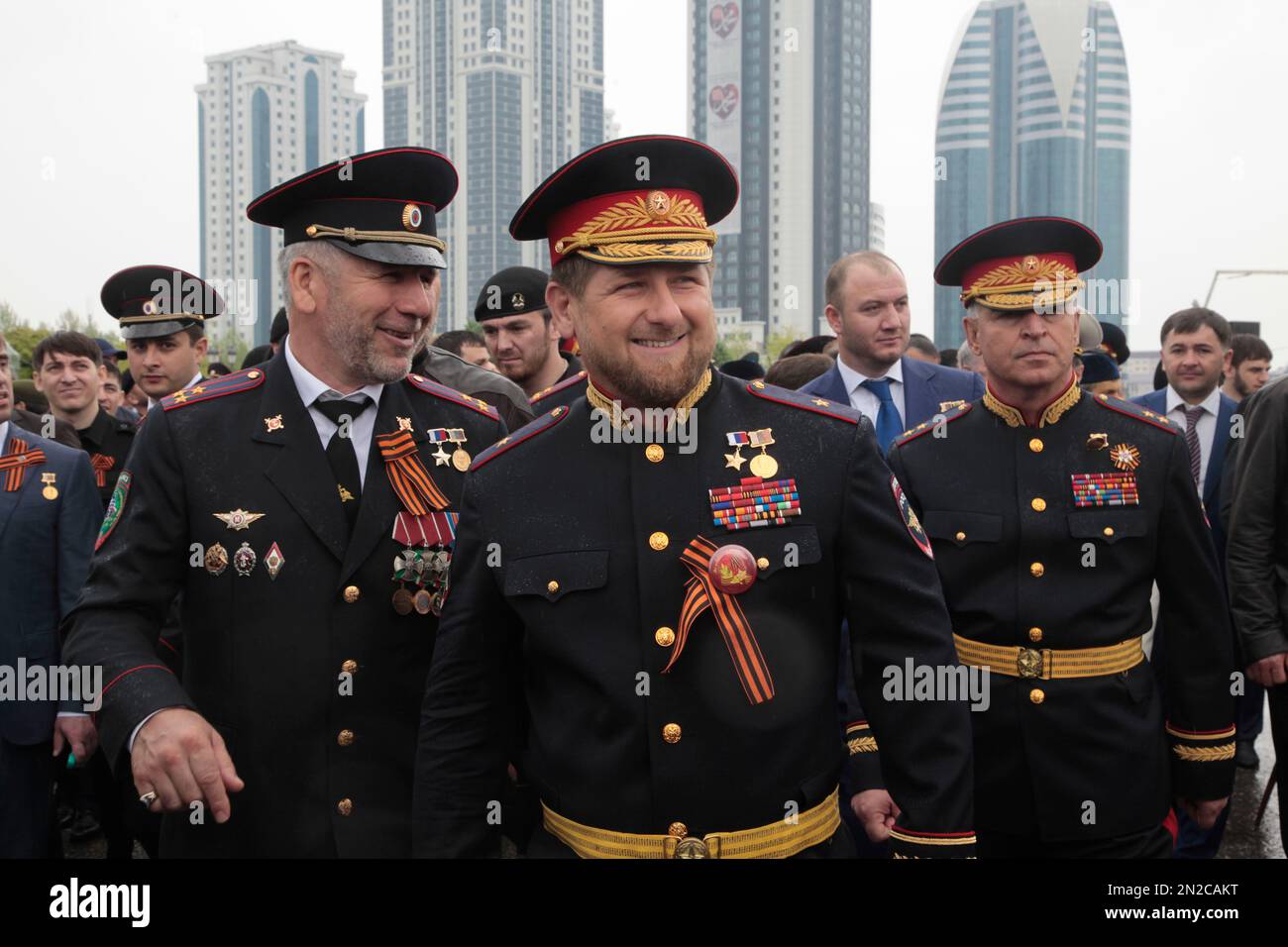 Chechen regional leader Ramzan Kadyrov, center, wearing a Russian ...