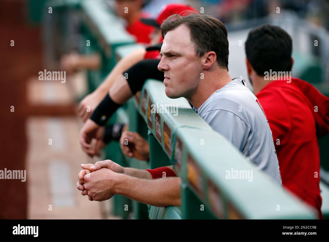 Cincinnati Reds' Jay Bruce stands in the dugout before a baseball game ...