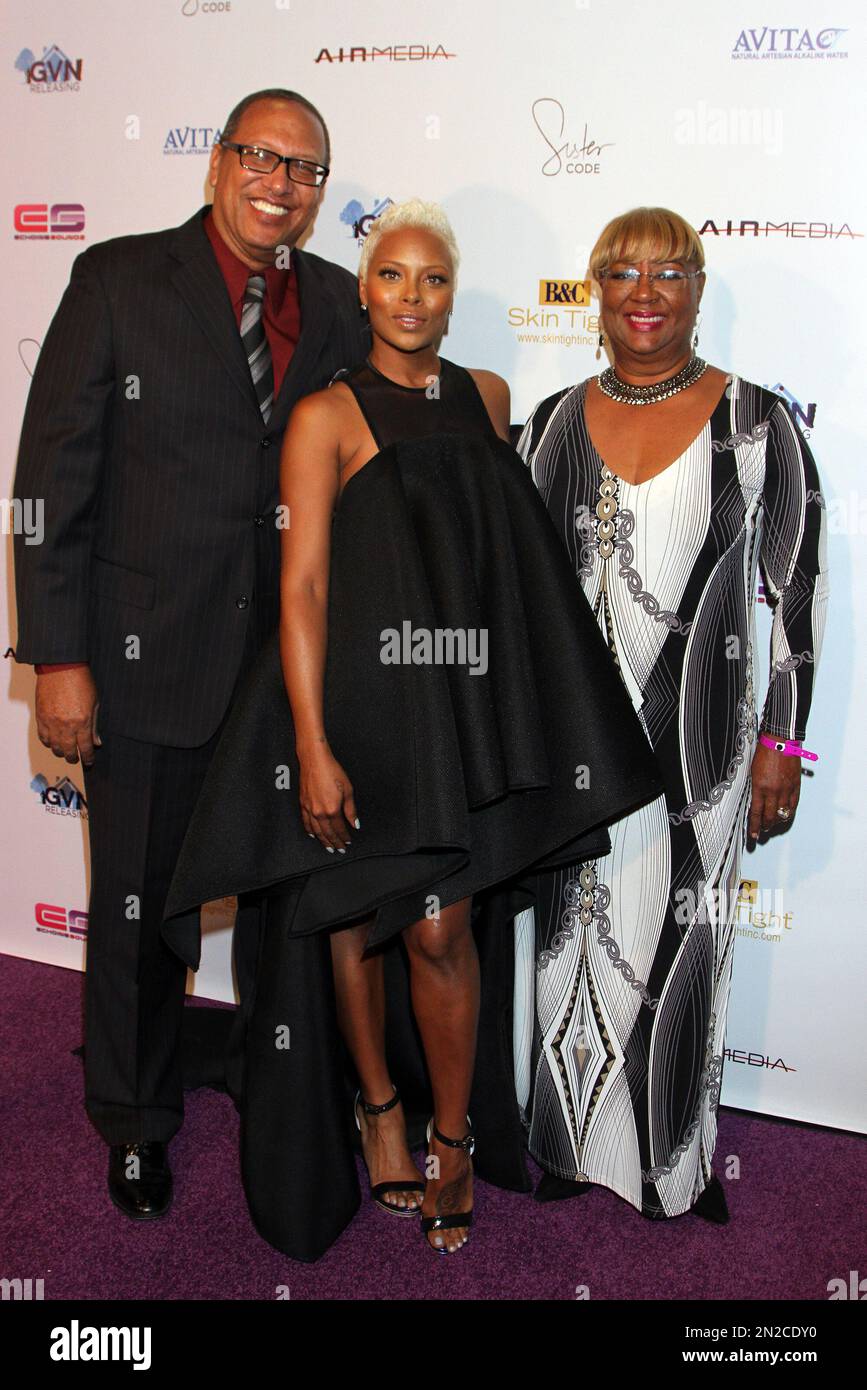 Actress Eva Marcille (C) with parents Evan Pigford and Michelle Pigford ...