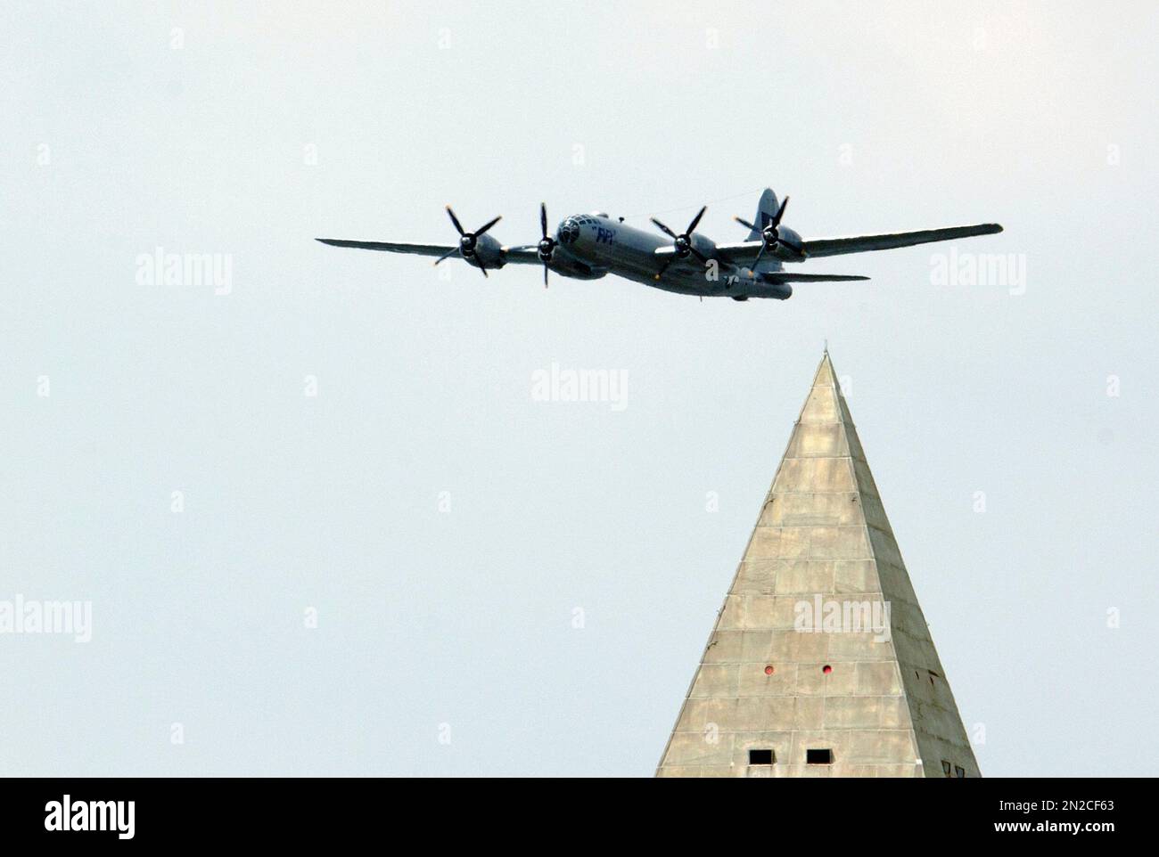 The Boeing B-29 Superfortress, flies near the Washington Monument over ...