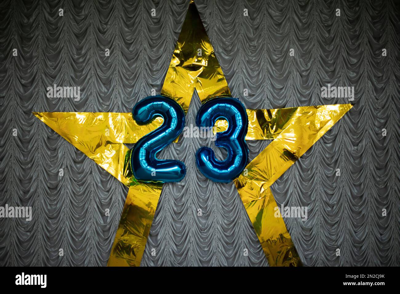 Number 23 of balloons. Decoration with numbers. Star of gold hangs on ...
