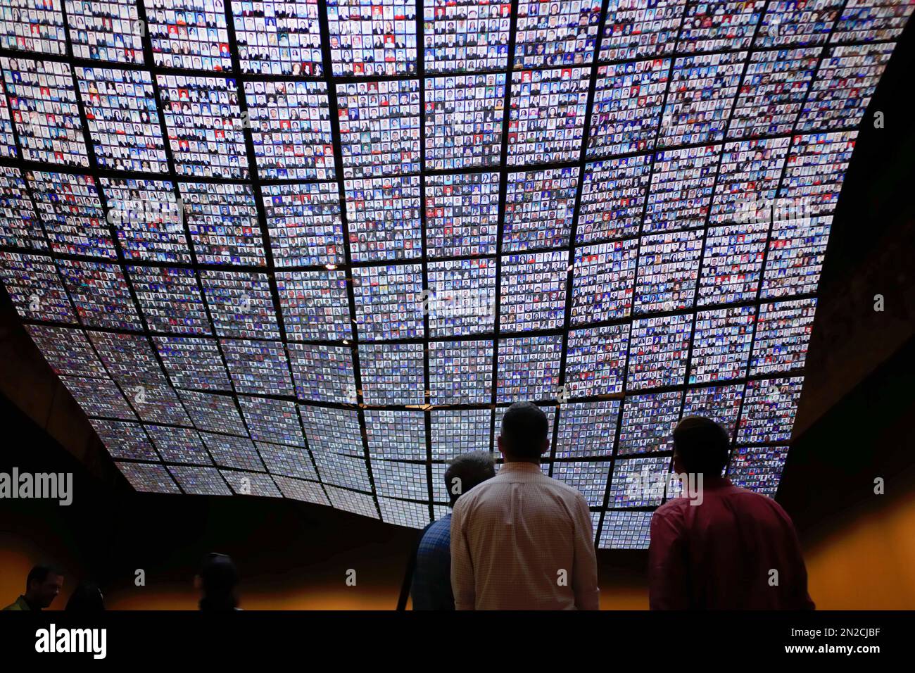 Visitors look at the 9,216 LCD panels of the 'The portrait of Sakip ...