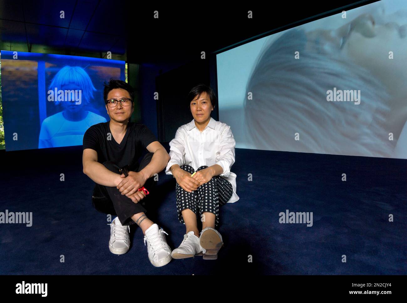 South Korea's artists Moon Kyungwon, right, and Jean Joonho pose inside ...