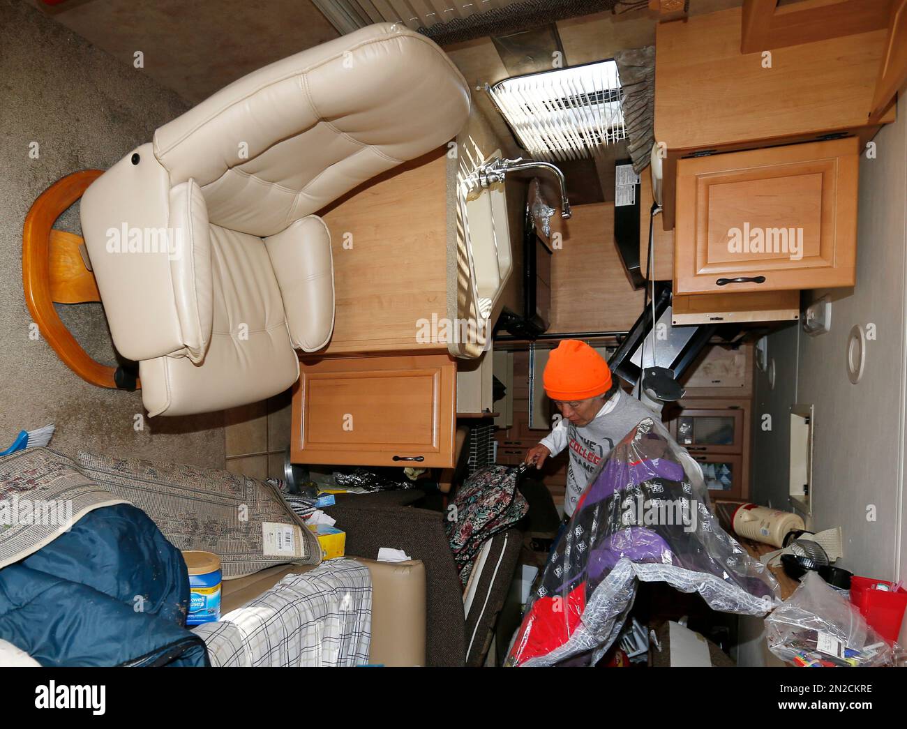 Yuki Fukui makes his way through his recreational vehicle, which is ...