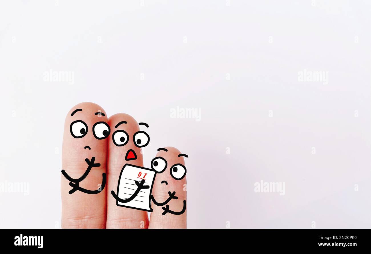 Two fingers are decorated as two person. They are not happy for the ...