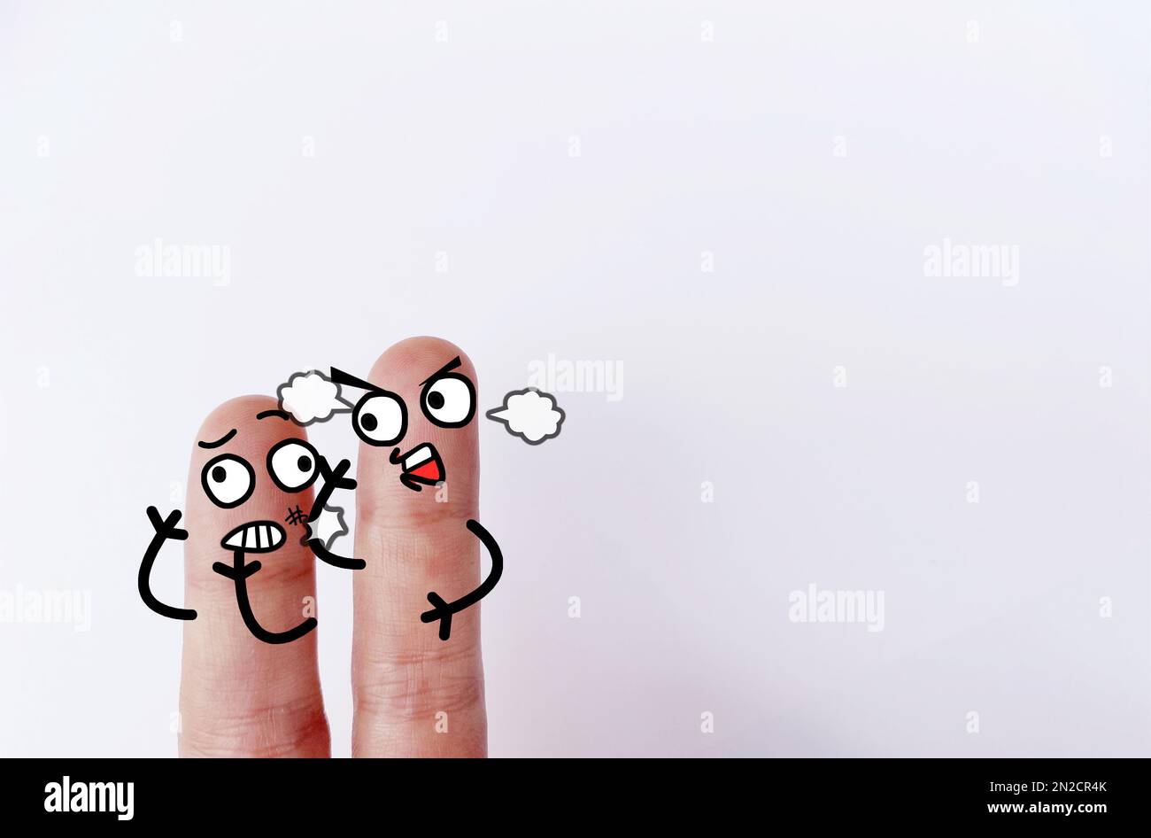 Two fingers are decorated as two person. One of them is verbally ...