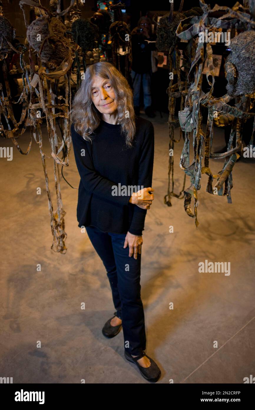 Australian artist Fiona Hall poses inside the Australian pavilion where ...