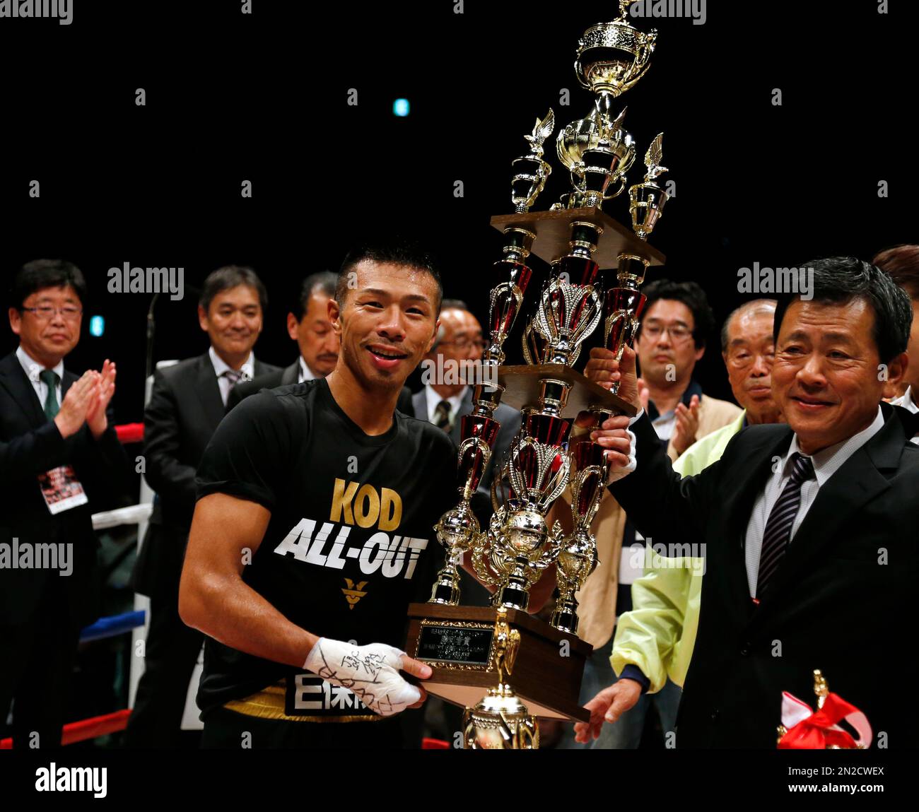 Japanese champion Takashi Uchiyama poses for a photo with the winner's ...