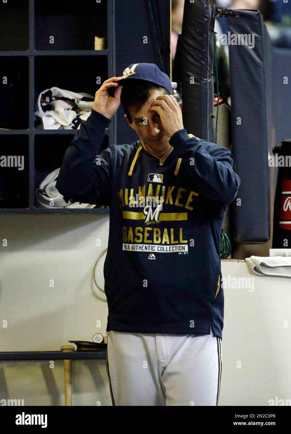 Milwaukee Brewers manager Craig Counsell scratches his head during the ...