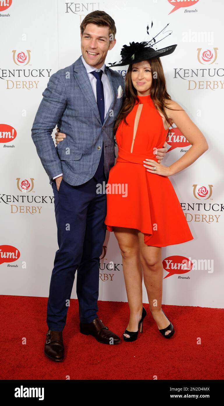 Liam McIntyre (left) and Erin McIntyre arrive on the red carpet at the ...