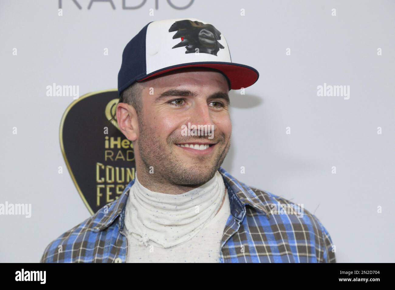 Sam Hunt arrives at the iHeartRadio Country Festival held at the Frank ...