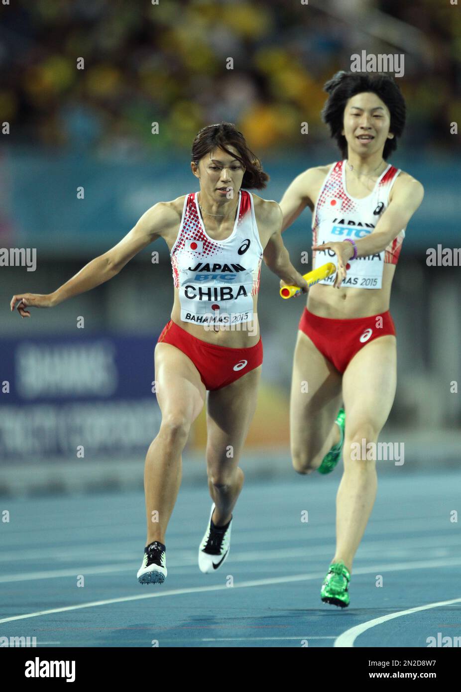 Japan's Asami Chiba takes the baton from Seika Aoyama in the Women's ...