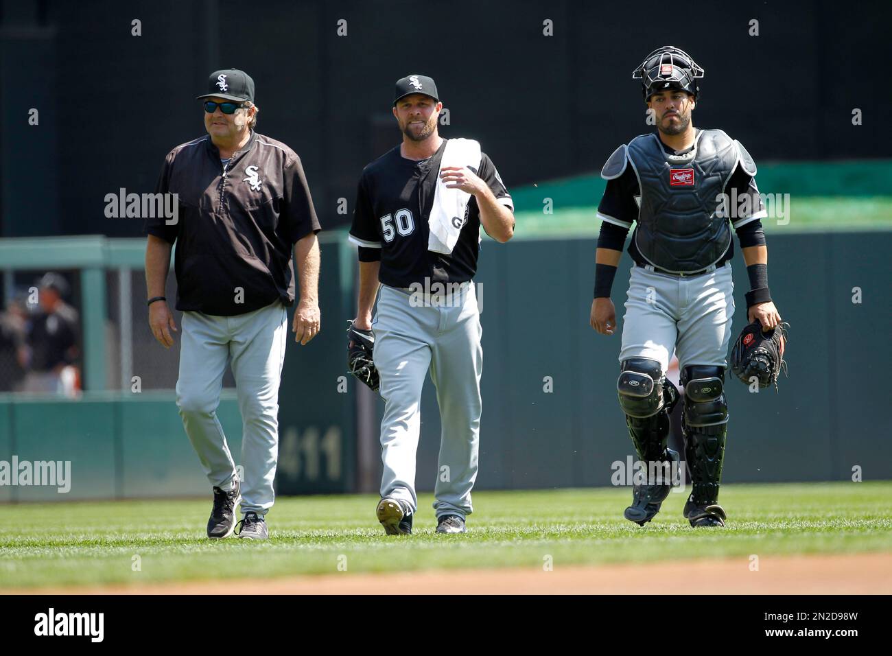 Chicago White Sox pitching coach Don Cooper, left, starting pitcher ...