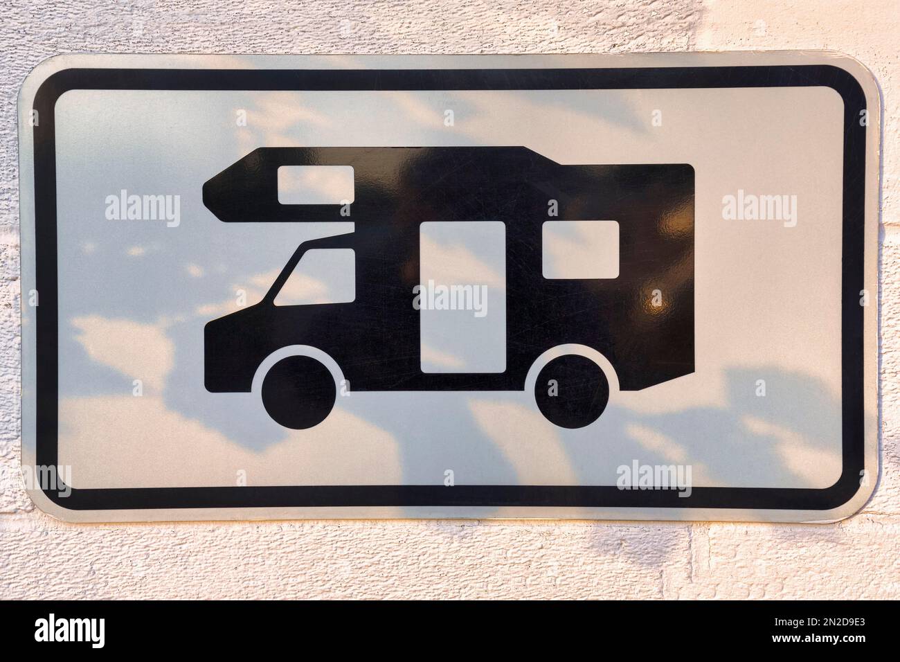 Sign with pictogram camper van on a wall, camper van pitch, Schleswig ...