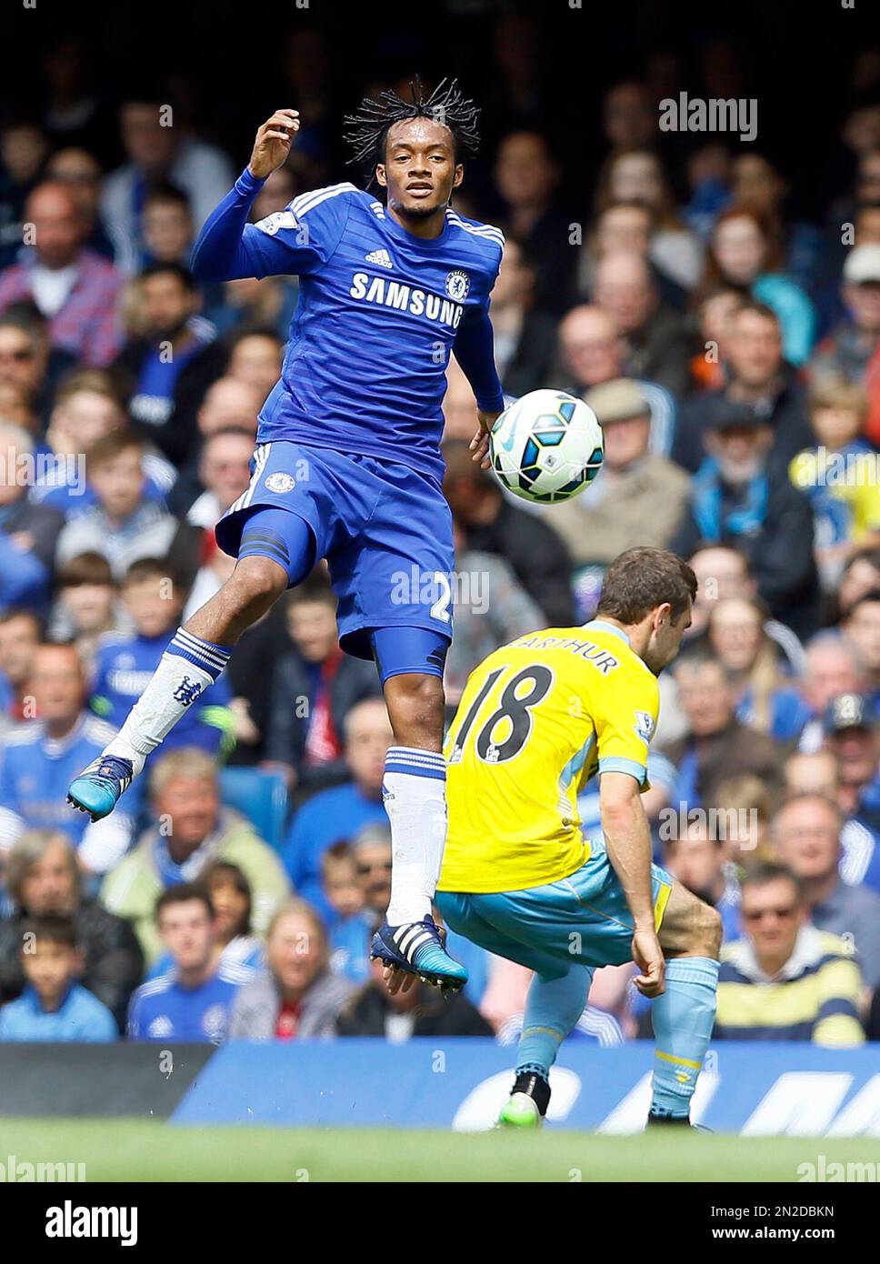 Chelsea's Juan Cuadrado rises above Crystal Palace’s James McArthur ...