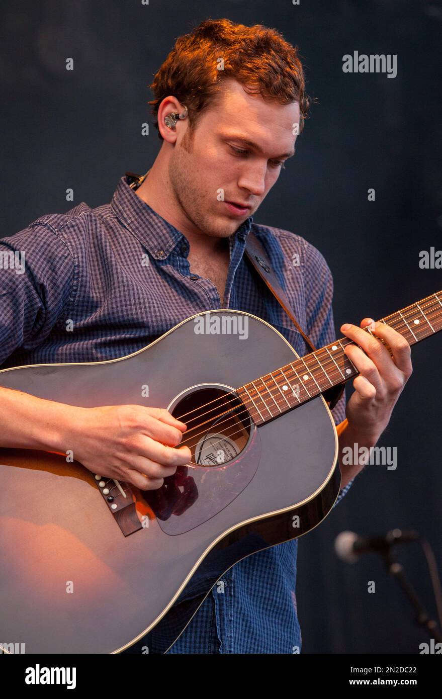 Singer-songwriter Phillip Phillips performs with his band at Draft Town ...
