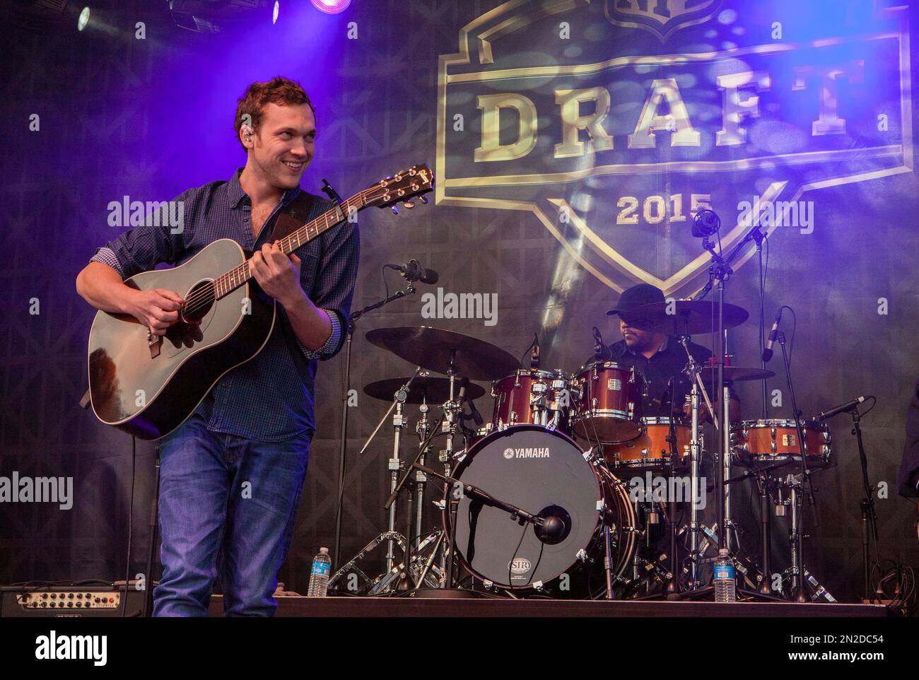 Singer-songwriter Phillip Phillips performs with his band at Draft Town ...