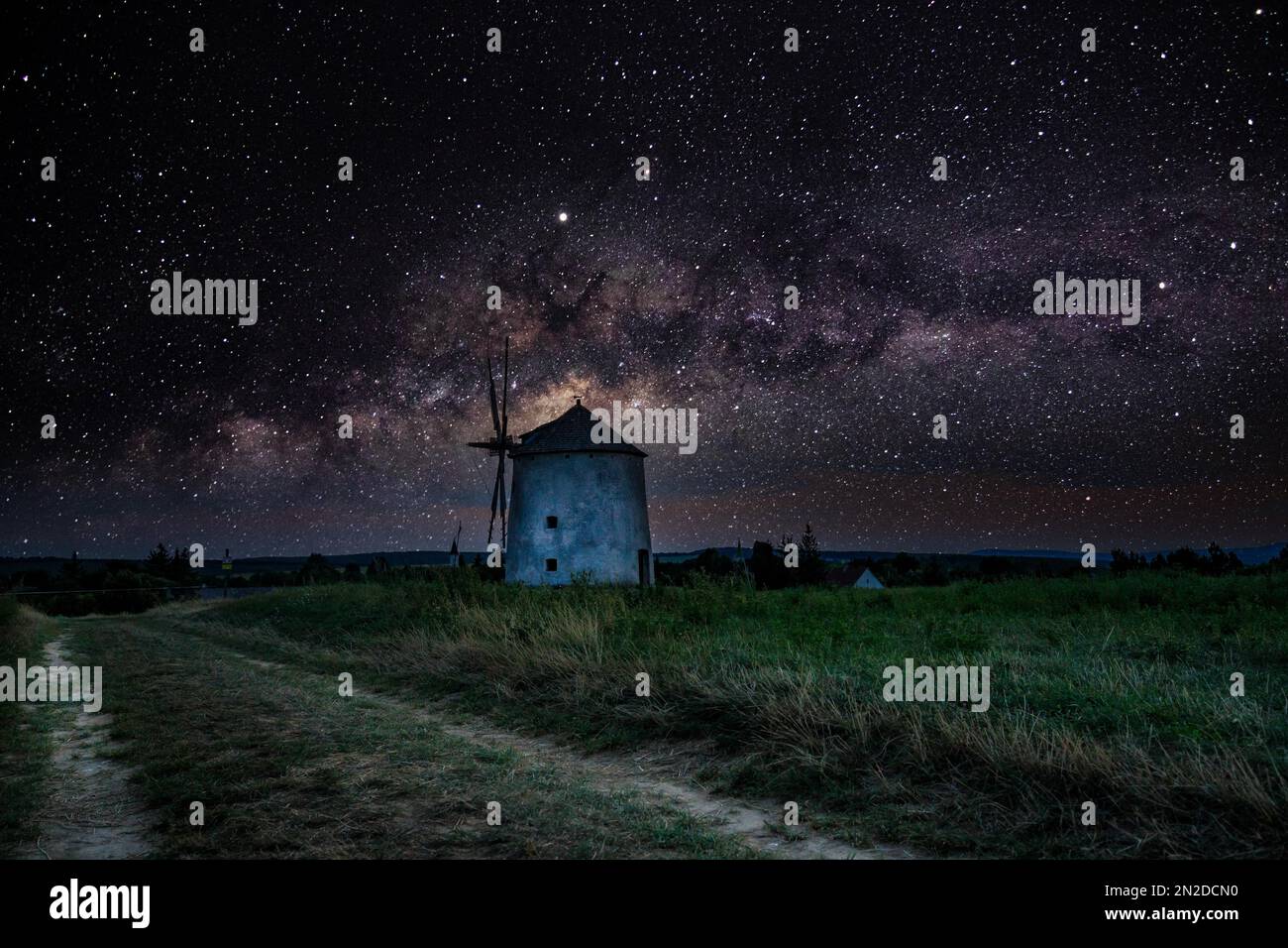The Old Windmill of Tes iin the night with Milky Way and starry sky ...
