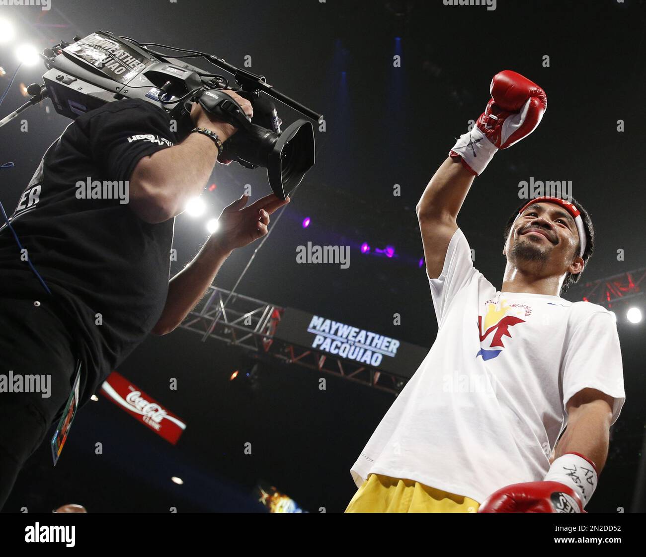 Manny Pacquiao, from the Philippines, acknowledges the crowd before the ...