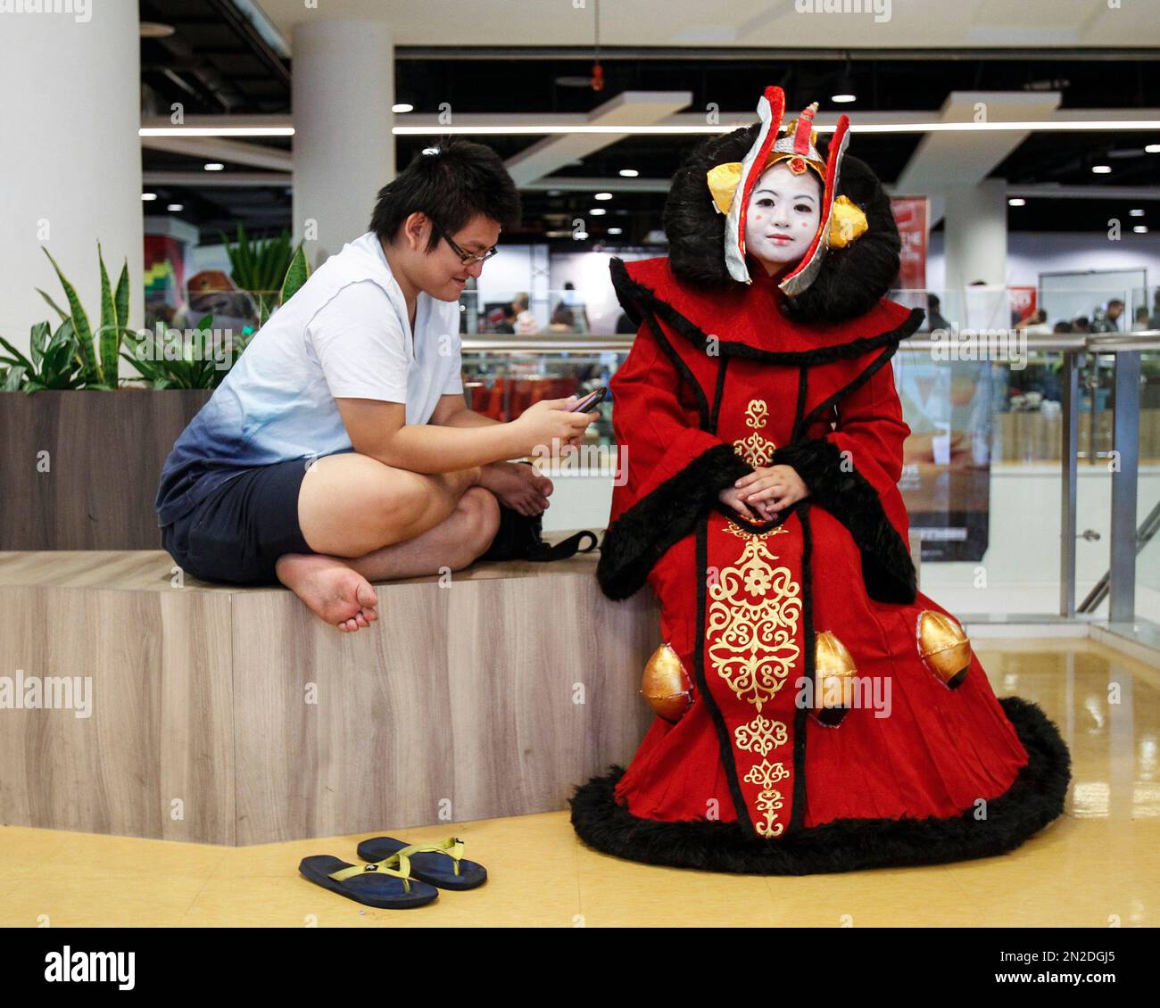 Star Wars fan Michelle Chee, 32, right, dressed up as Padme Amidala has ...