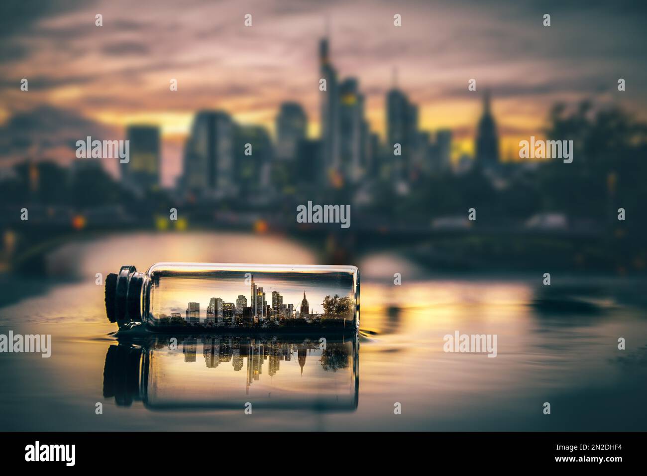 Frankfurt skyline in a small bottle, I reflected in a puddle, the ...