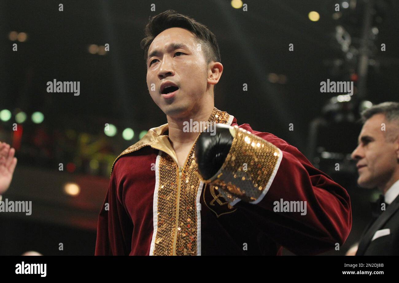 Takahiro Ao, of Japan, enters the ring before his WBO lightweight title ...