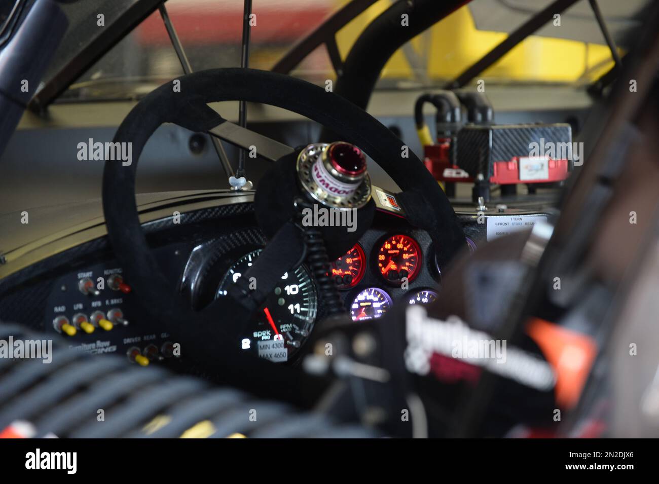 The dashboard panel of a NASCAR Sprint Cup Series race car is lit up ...