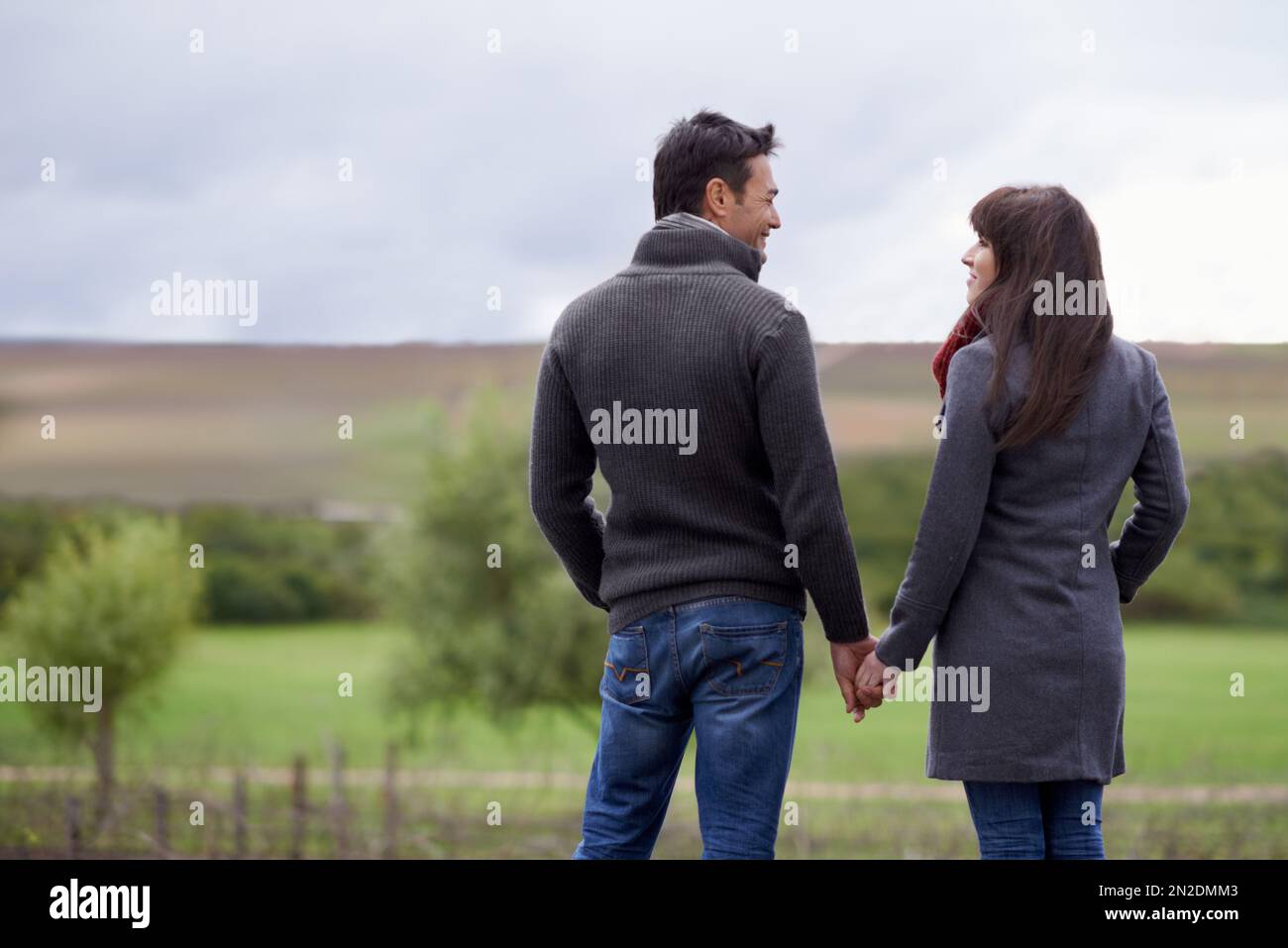 Lost in each others eyes. a loving couple enjoying a day out together ...