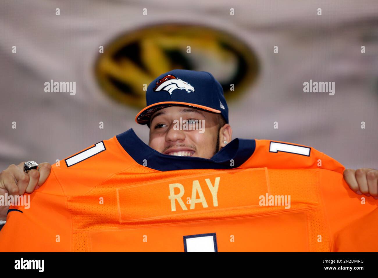 Shane Ray stands on stage after being drafted 23rd by the Denver ...