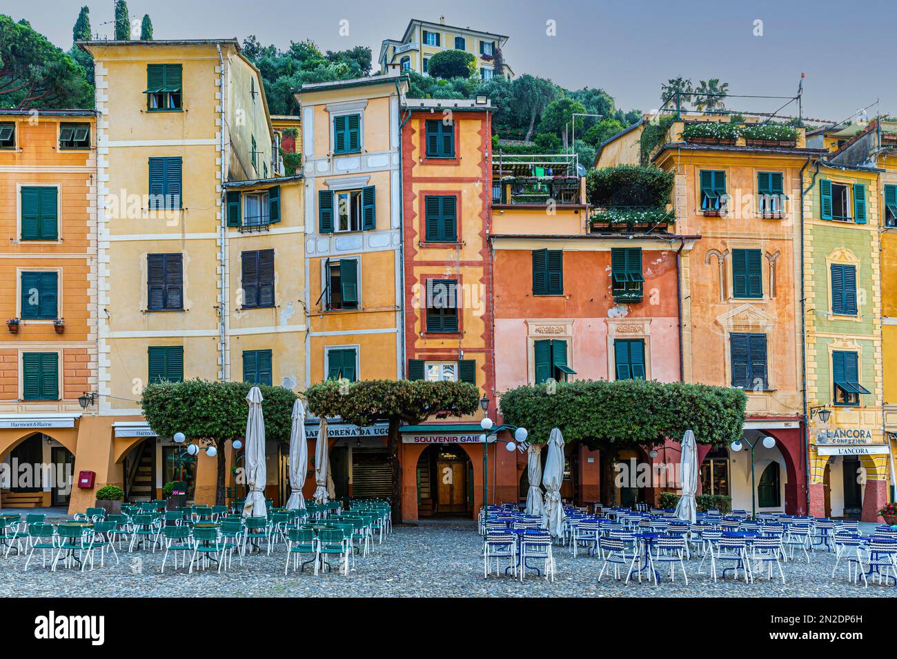 Closed sidewalk cafes on the Piazza Martini dellOlivetta, behind them ...