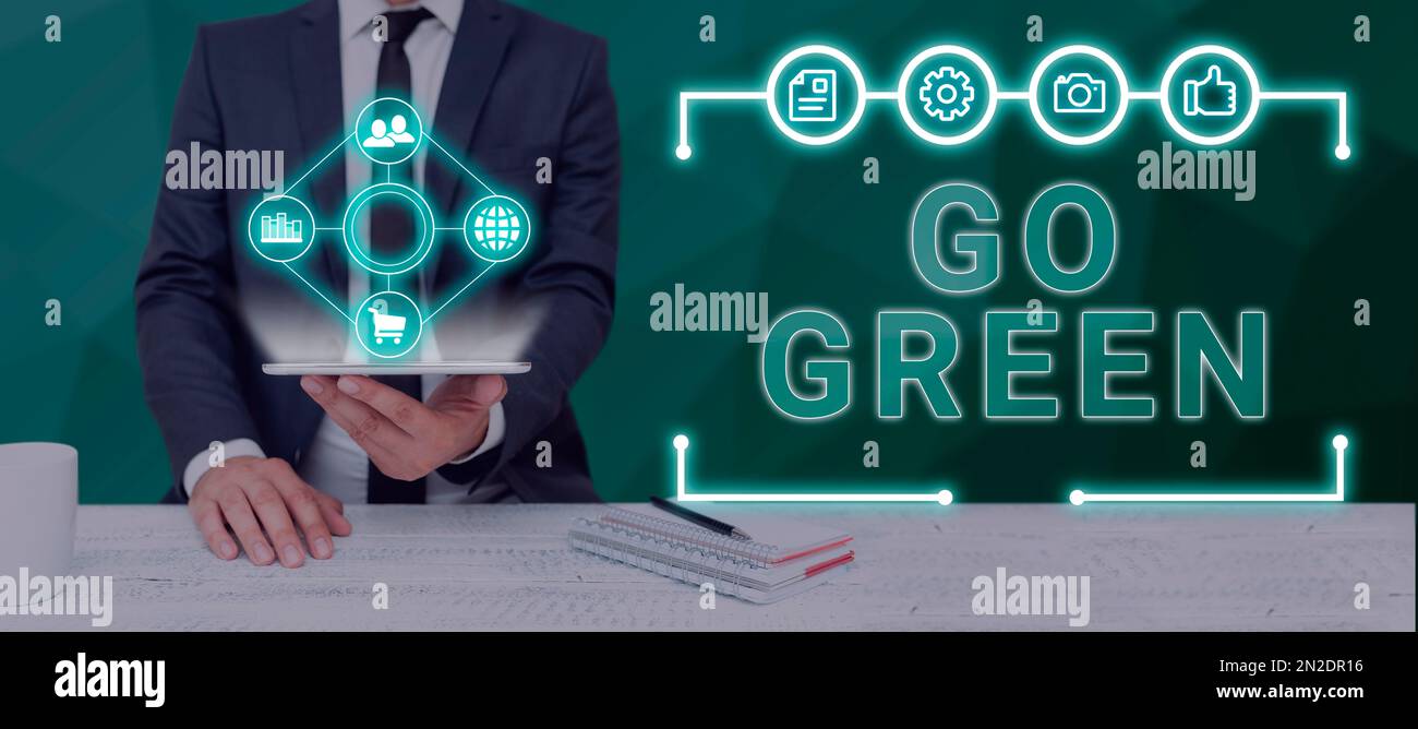 Text caption presenting Go Green. Conceptual photo making more ...