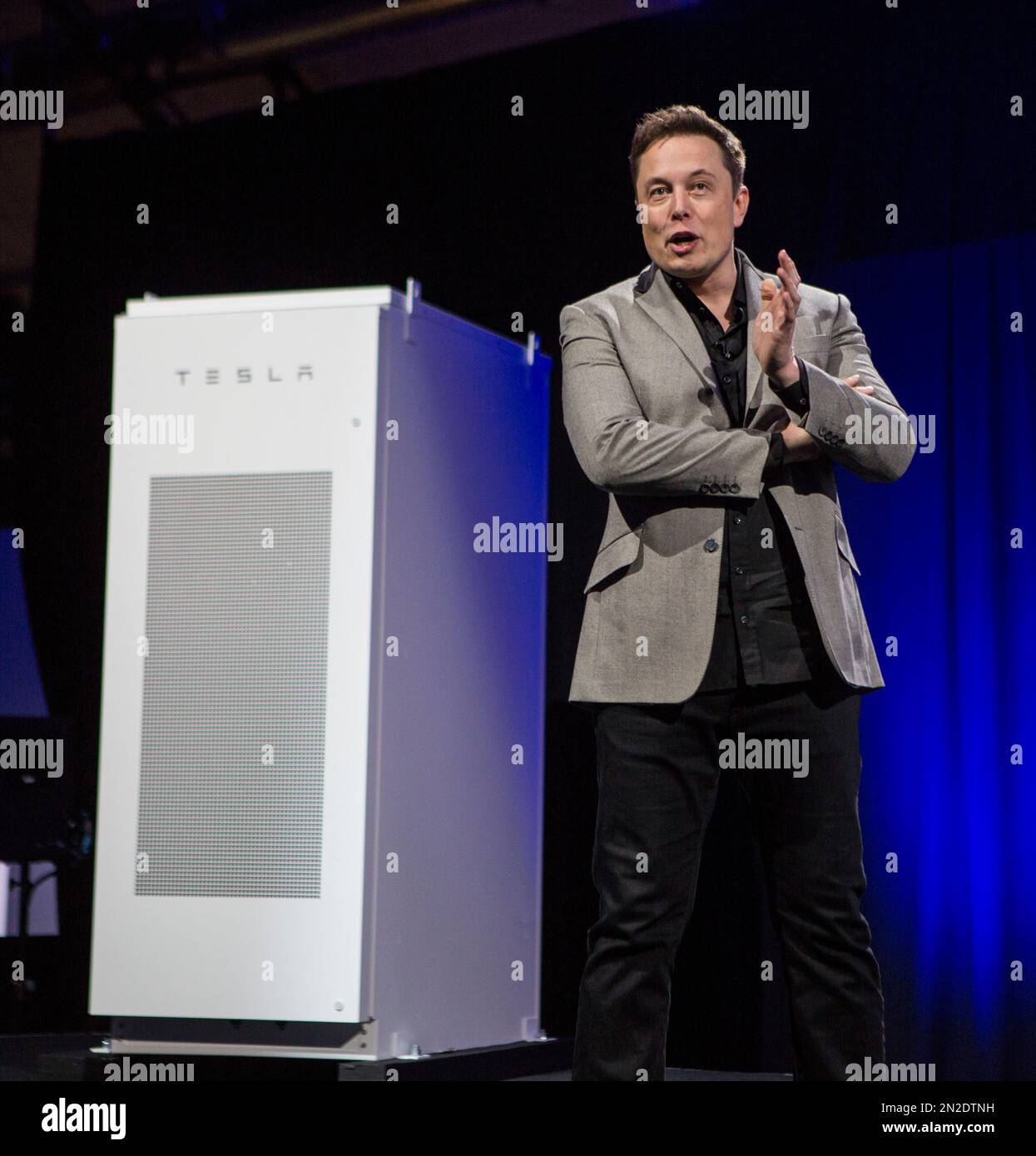 Elon Musk, CEO of Tesla Motors Inc., unveils the company's newest ...