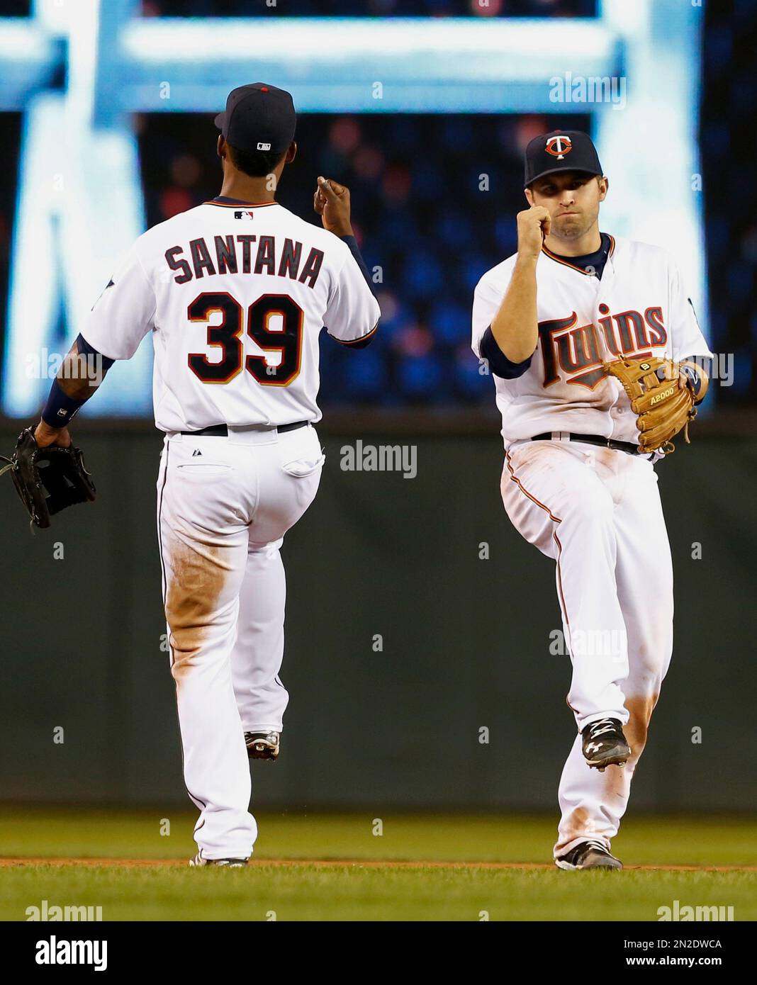 Minnesota Twins shortstop Danny Santana, left, and second baseman Brian ...