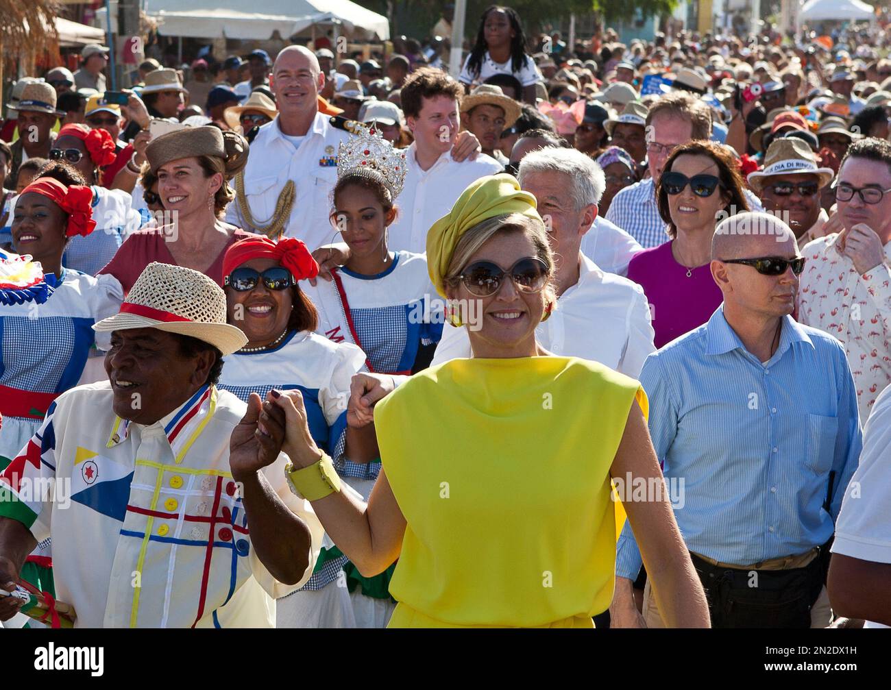 Queen Maxima of the Netherlands, center, dances on a street of Rincon ...