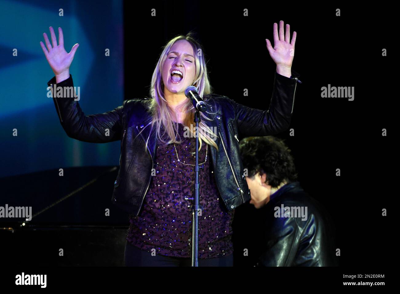 Maureen "Mozella" McDonald performs her song "Wrecking Ball" at the ...