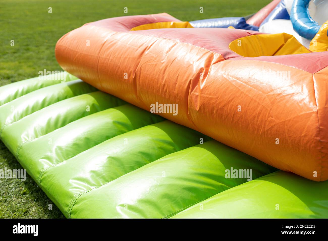 Inflatable construction in amusement park. Obstacle course for children ...