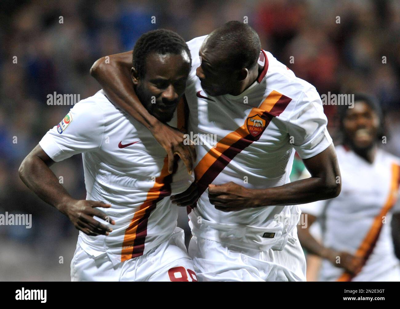 Roma's Seydou Doumbia, left, celebrates with his teammate Victor Ibarbo ...