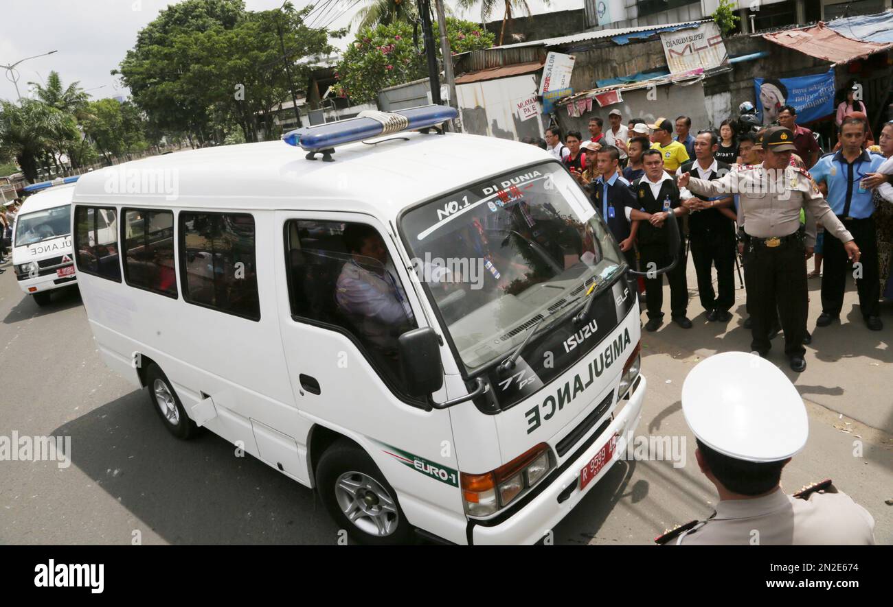 Ambulances carrying the bodies of Australian death-row prisoners Andrew ...