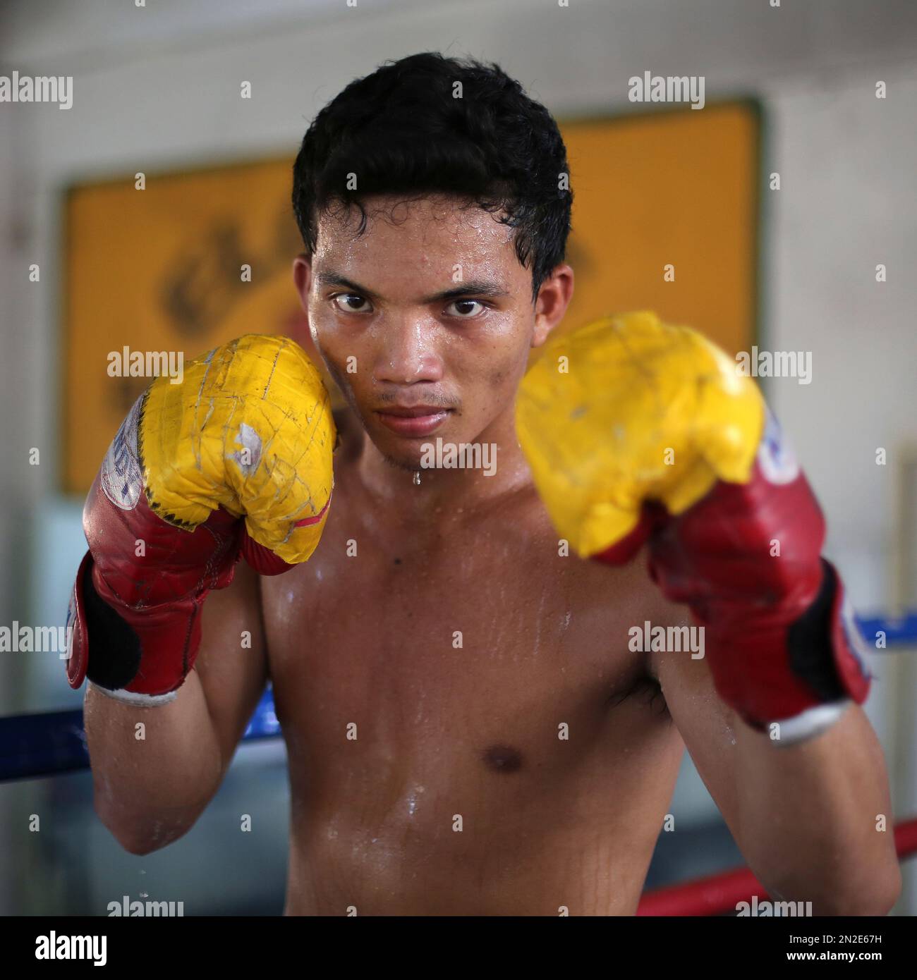 In this April 21, 2015, photo, Filipino boxer Meljun Penapin poses with ...