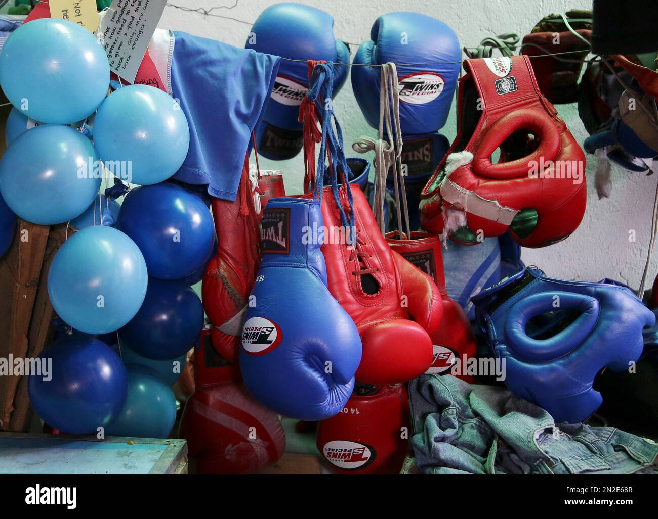 In this April 22, 2015, photo, boxing equipment hangs at a dormitory ...