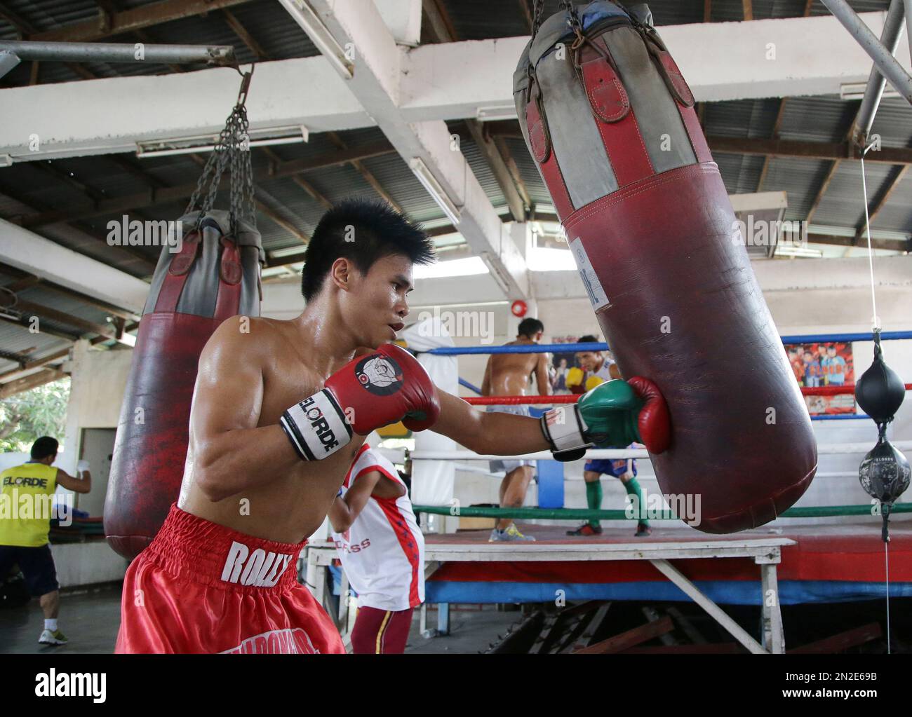 In this April 22, 2015, photo, Filipino boxer Rolly Macaso trains on a ...