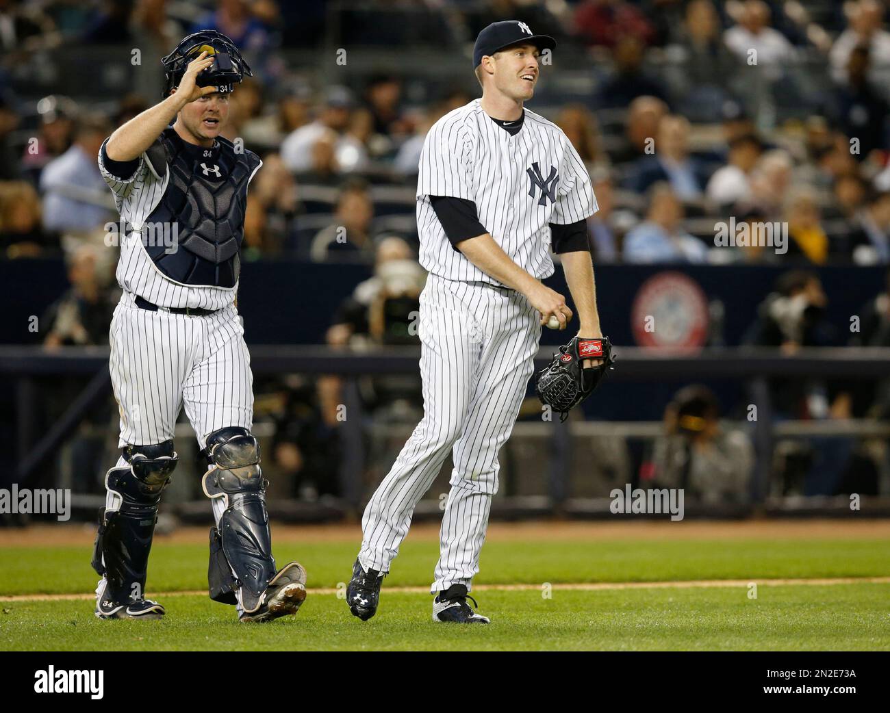 New York Yankees catcher Brian McCann (34) and New York Yankees starting pitcher Chase Whitley ...