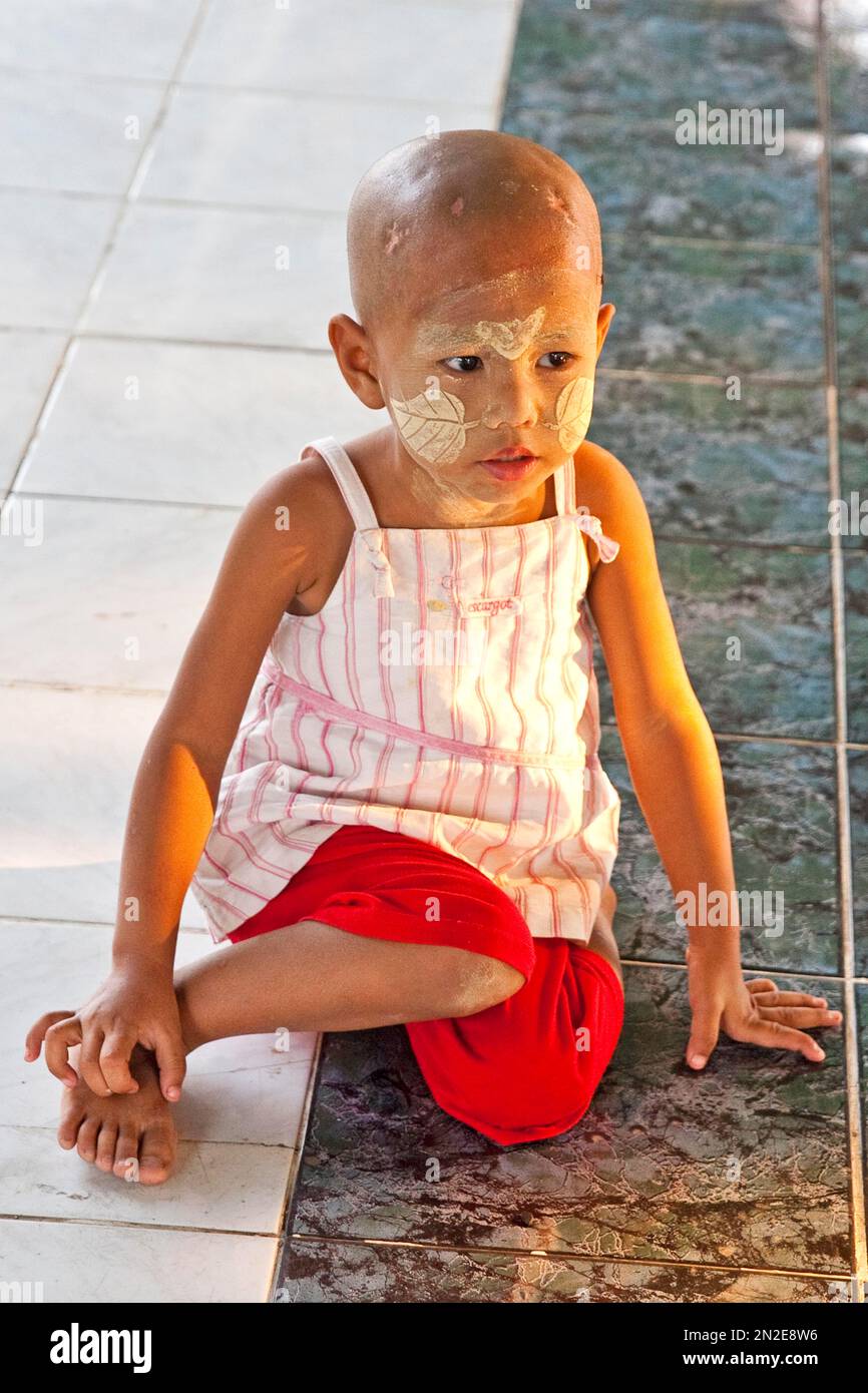Boy with face painting with Tanaka paste, Kuthodaw Pagoda, Mandalay ...